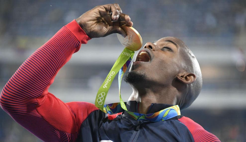 Here's why Olympians bite their medals | indy100 | indy100