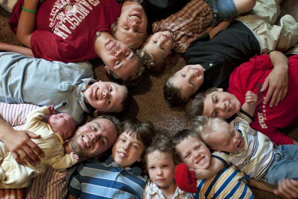 Will it be a boy or a girl? Family with 12 sons await new baby ...