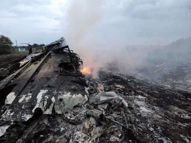 MH17 video: New footage from the aftermath of the crash released ...