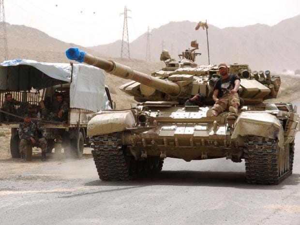 Isis 'losing control' of Palmyra as Syrian troops backed by Russian air ...