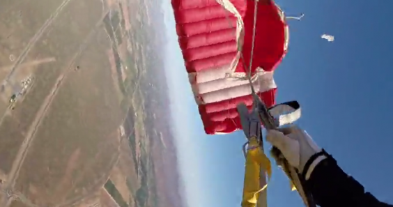Video shows terrifying moment skydiver has to cut parachute loose in ...