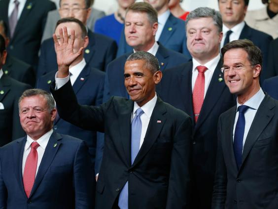 Obama flashes peace sign during world leaders photoshoot at nuclear ...