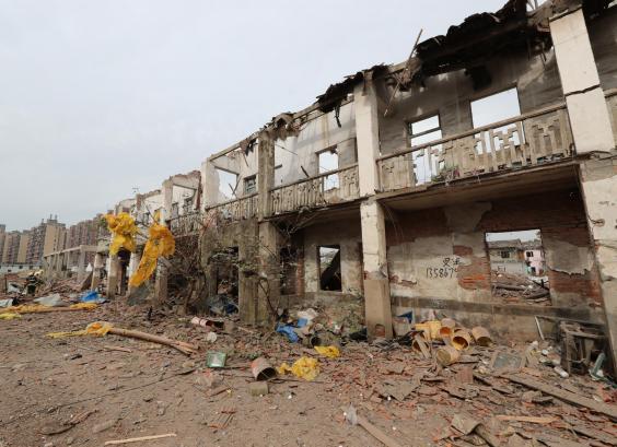 Two dead and 30 hurt after huge explosion levels buildings in Chinese ...