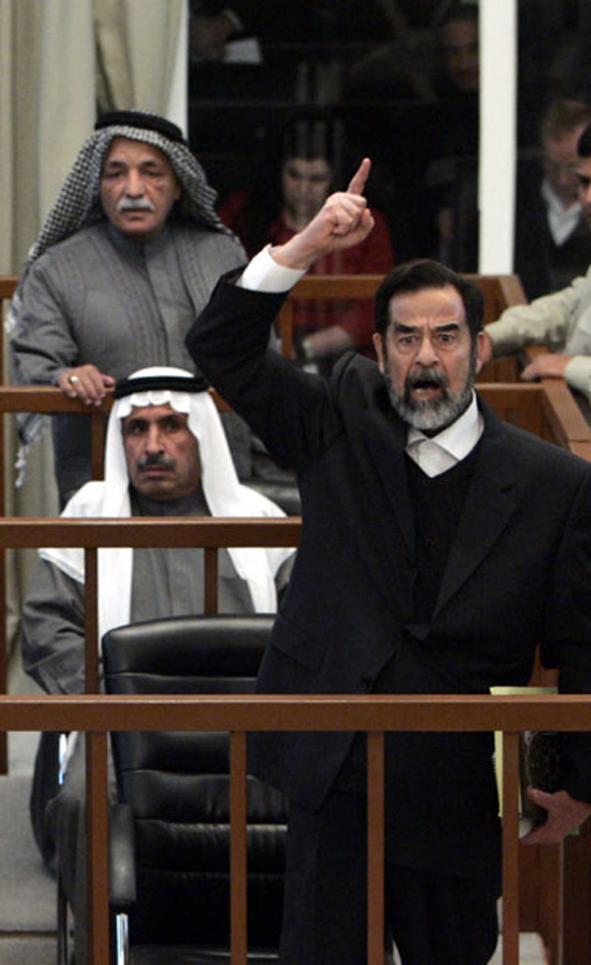 Saddam trial in shambles as former dictator and his defence team walk ...