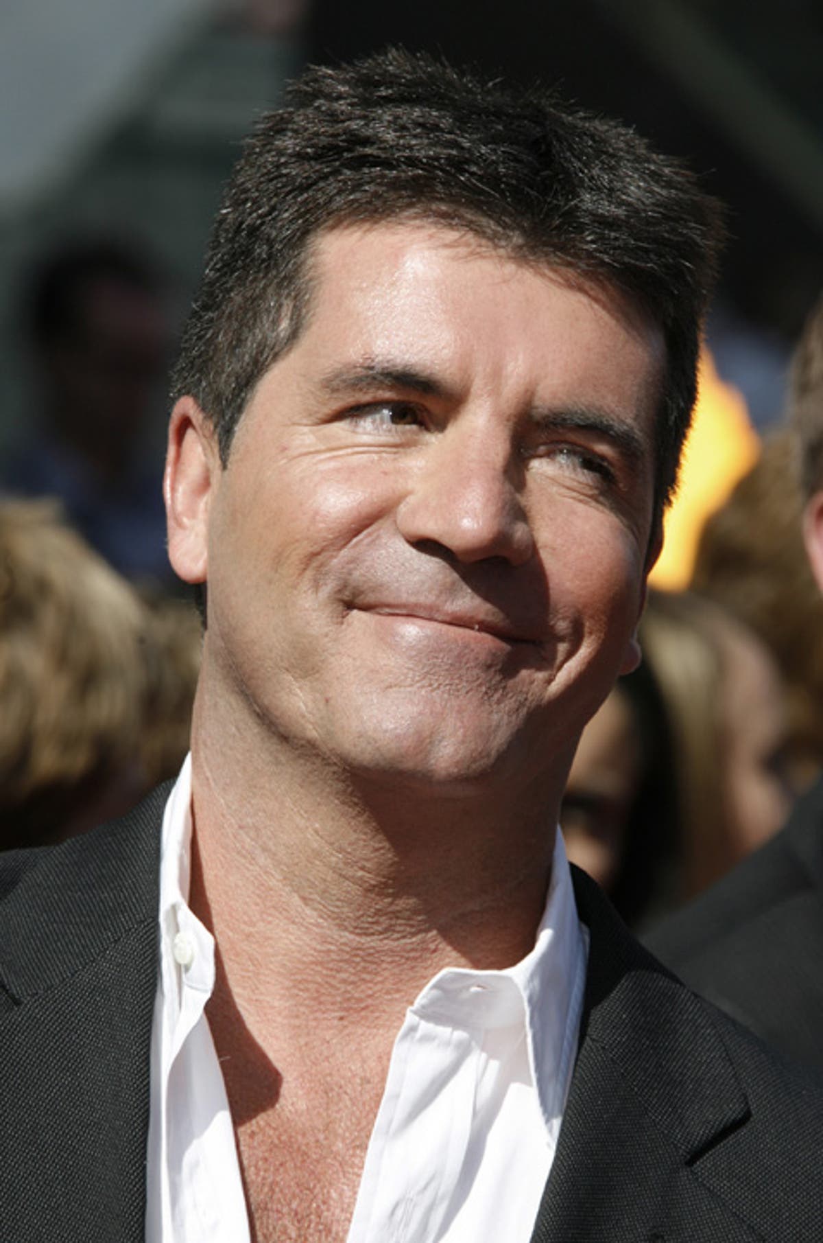 Mr Nice: Cowell pays off couple's mortgage | The Independent | The ...