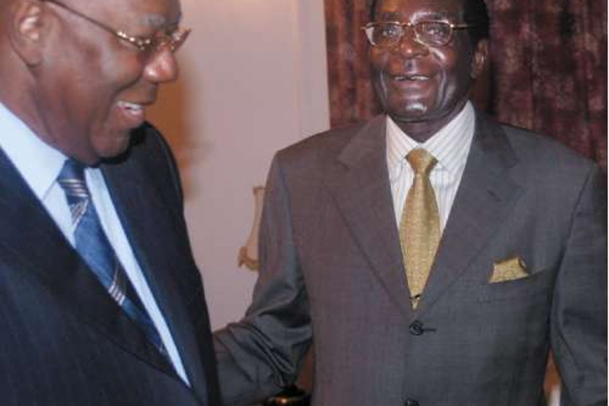 Mugabe's security men launch raids on opposition | The Independent ...