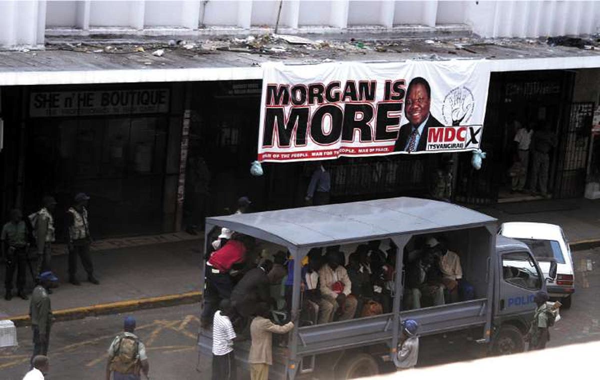 Zimbabwe riot police swoop on opposition HQ | The Independent | The ...