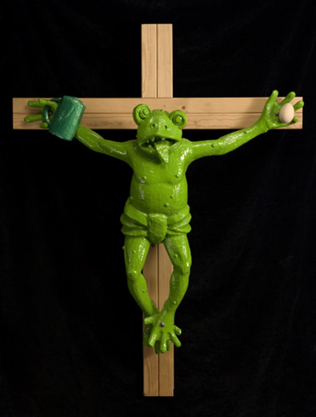 Pope angry over crucified green frog sculpture | The Independent | The ...