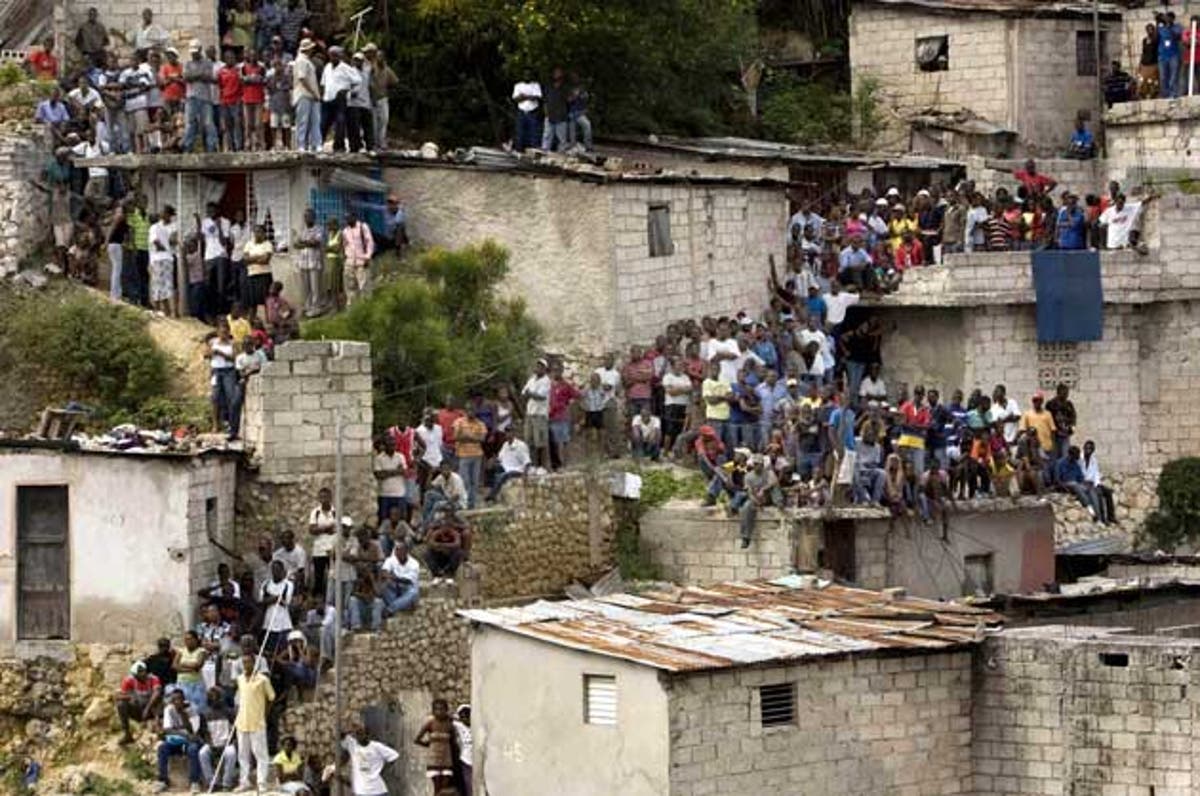 Scenes of panic at Haiti school collapse | The Independent | The ...
