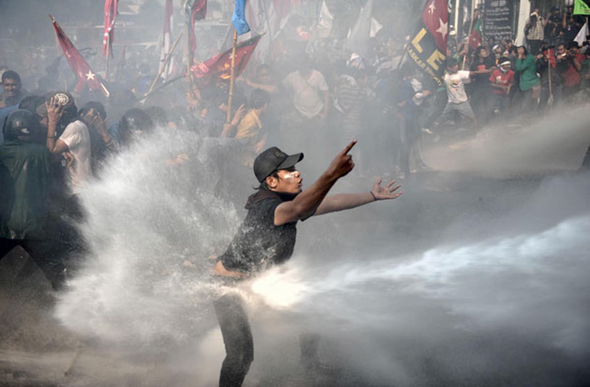 Police want water cannons to beat back city rioters | The Independent ...