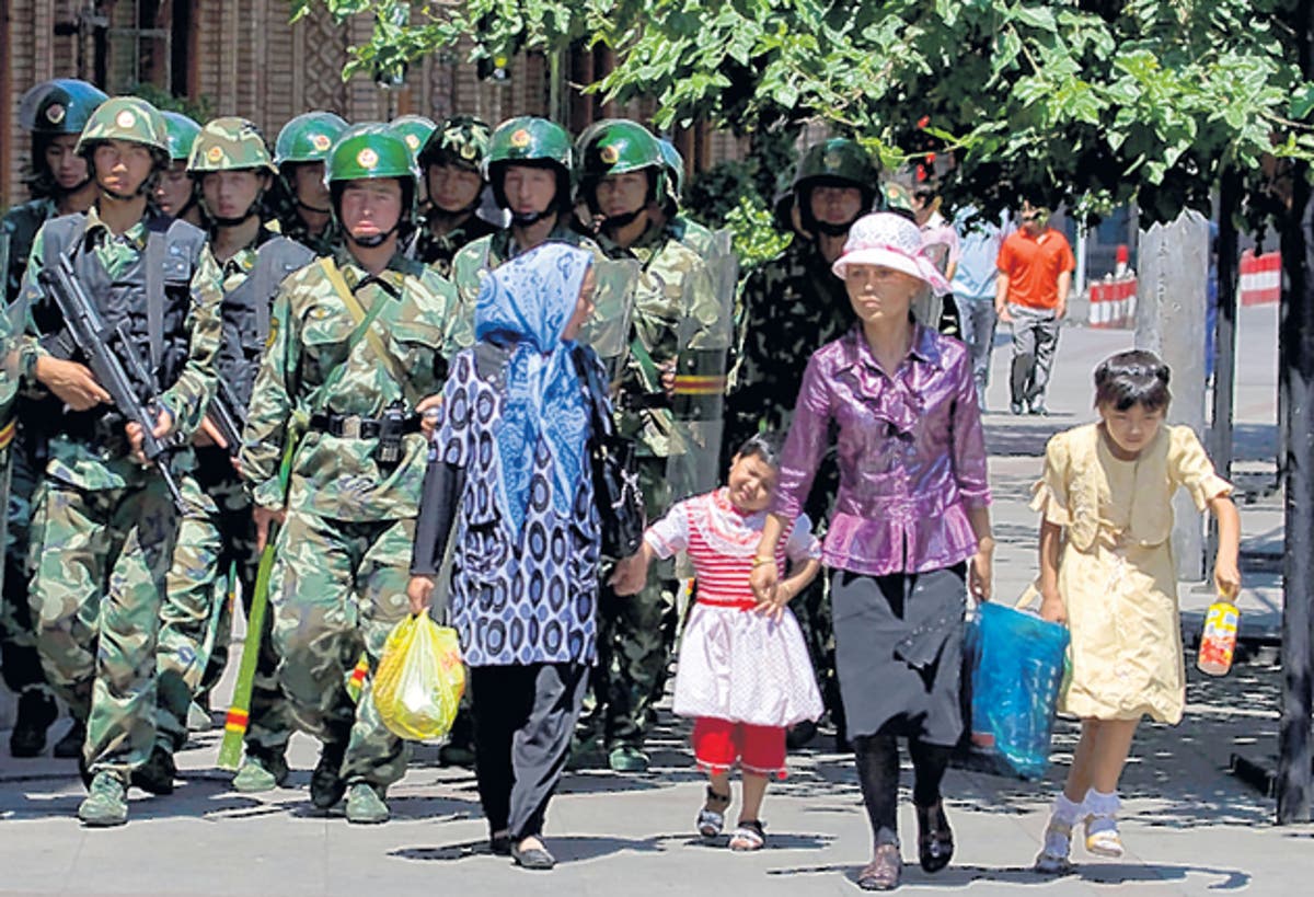 Chinese police break up Uighur protest at mosque | The Independent ...
