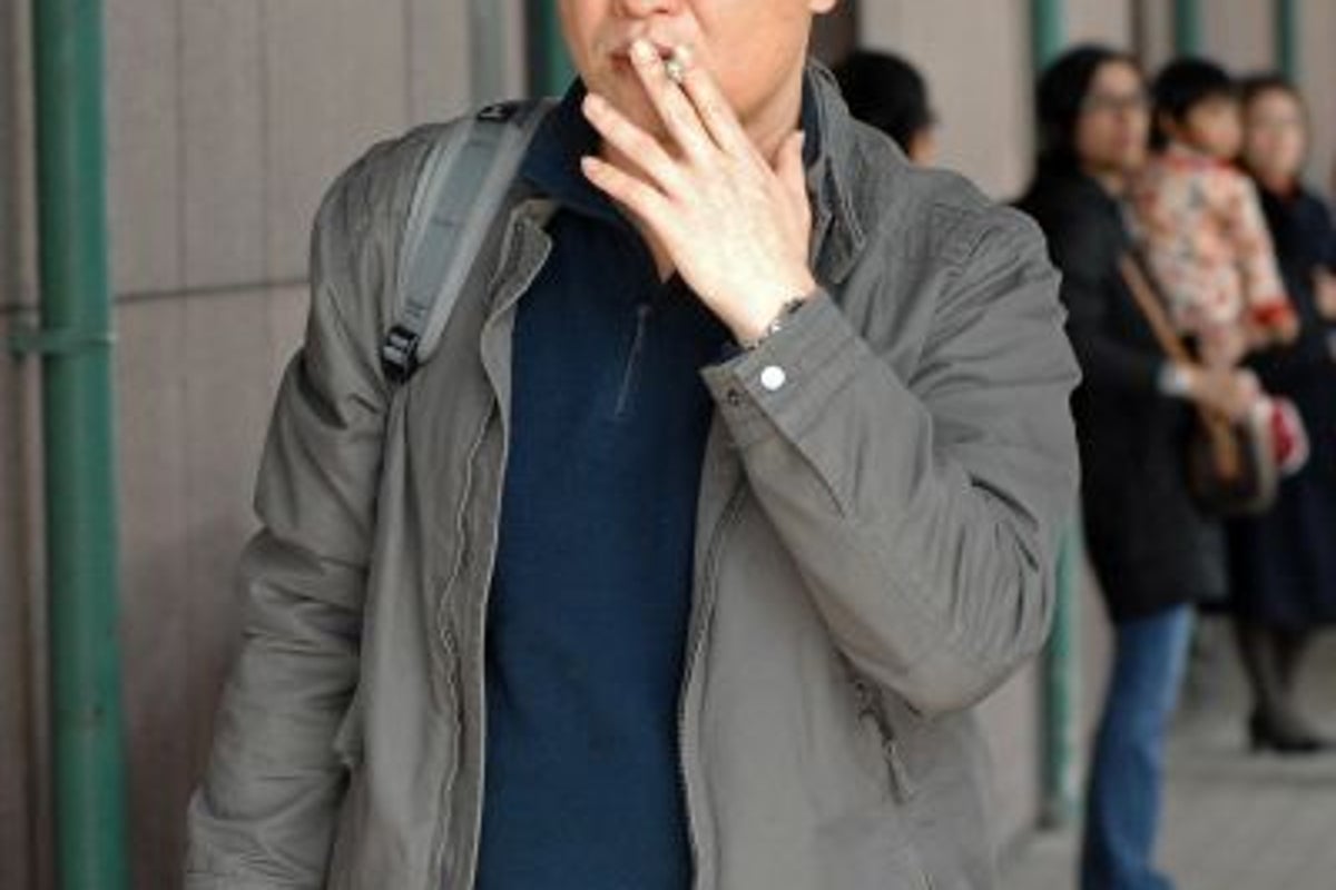 Taiwan aims to ban smoking while walking | The Independent | The ...