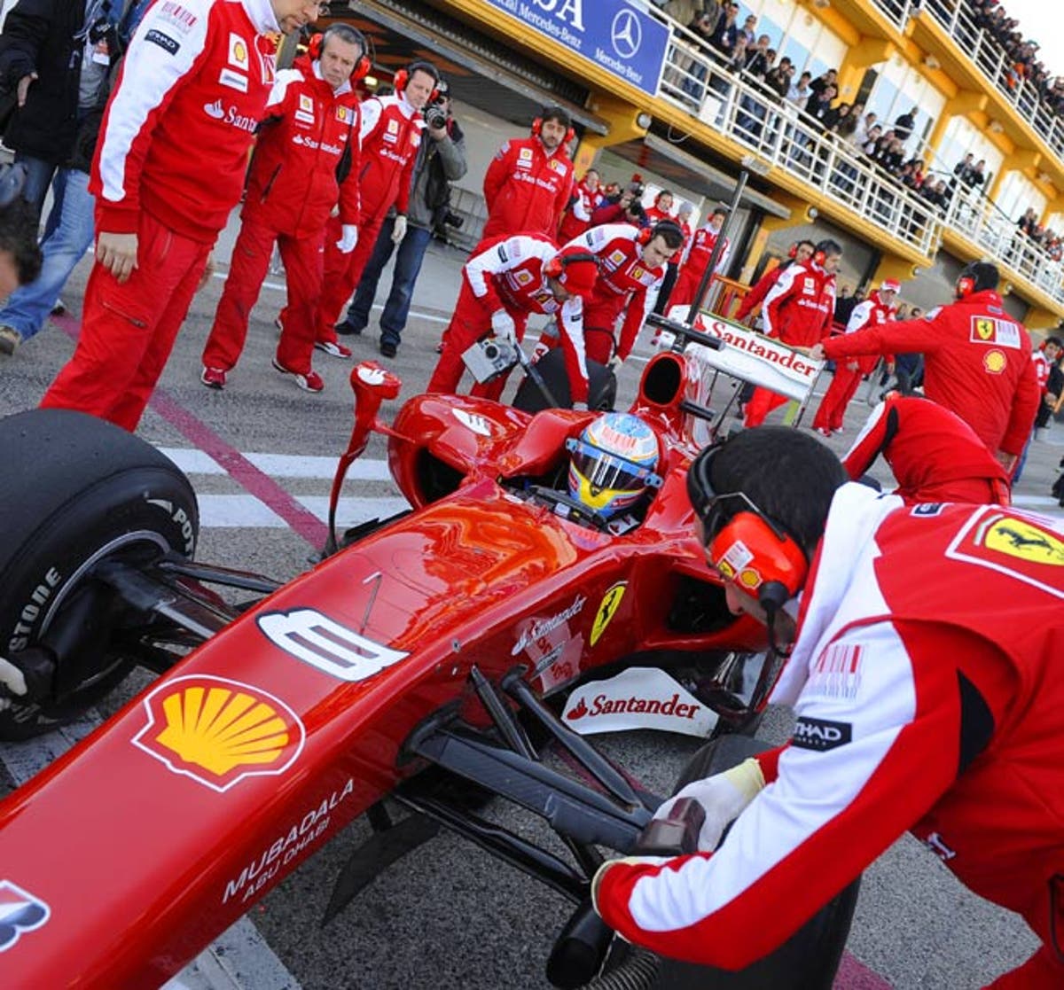 Alonso takes wheel of Ferrari for first time | The Independent | The ...