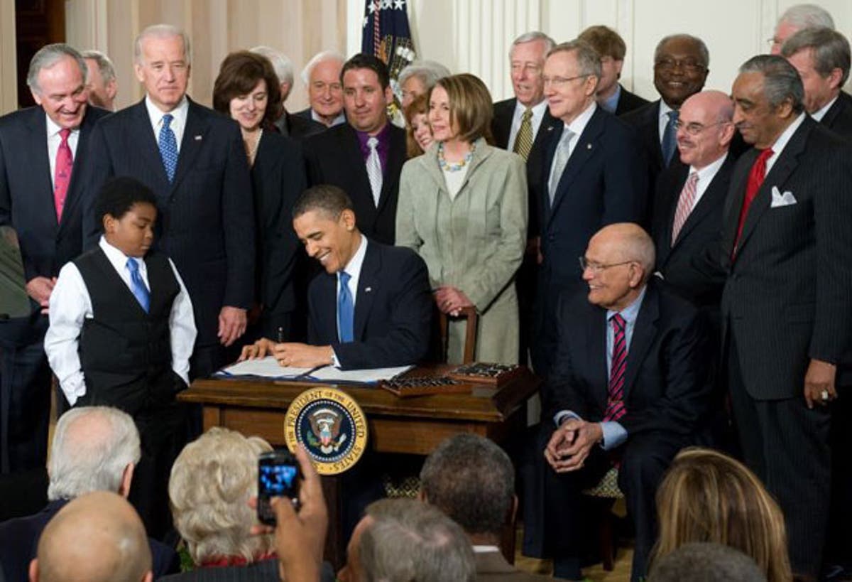 President Barack Obama signs historic healthcare bill | The Independent ...