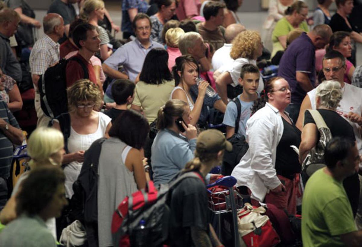Stranded passengers begin to return home | The Independent | The ...