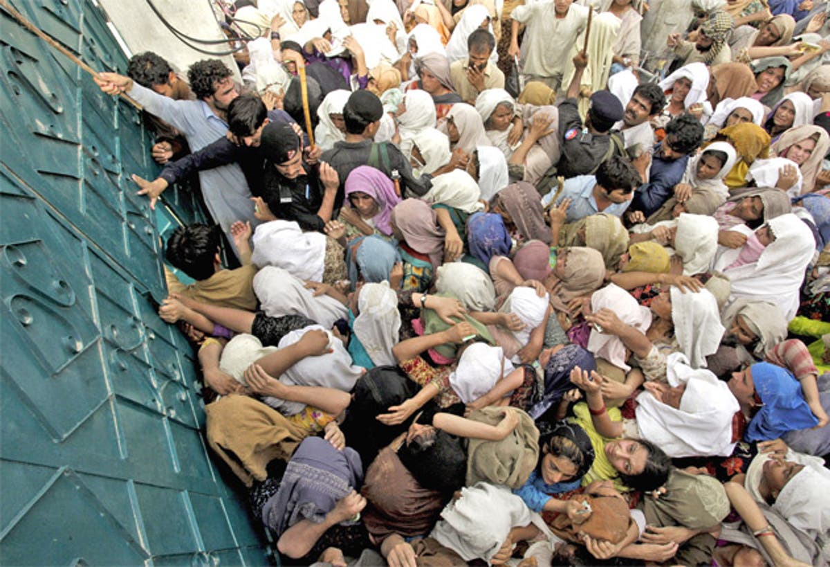 Mass evacuations as flood threatens to destroy dam | The Independent ...