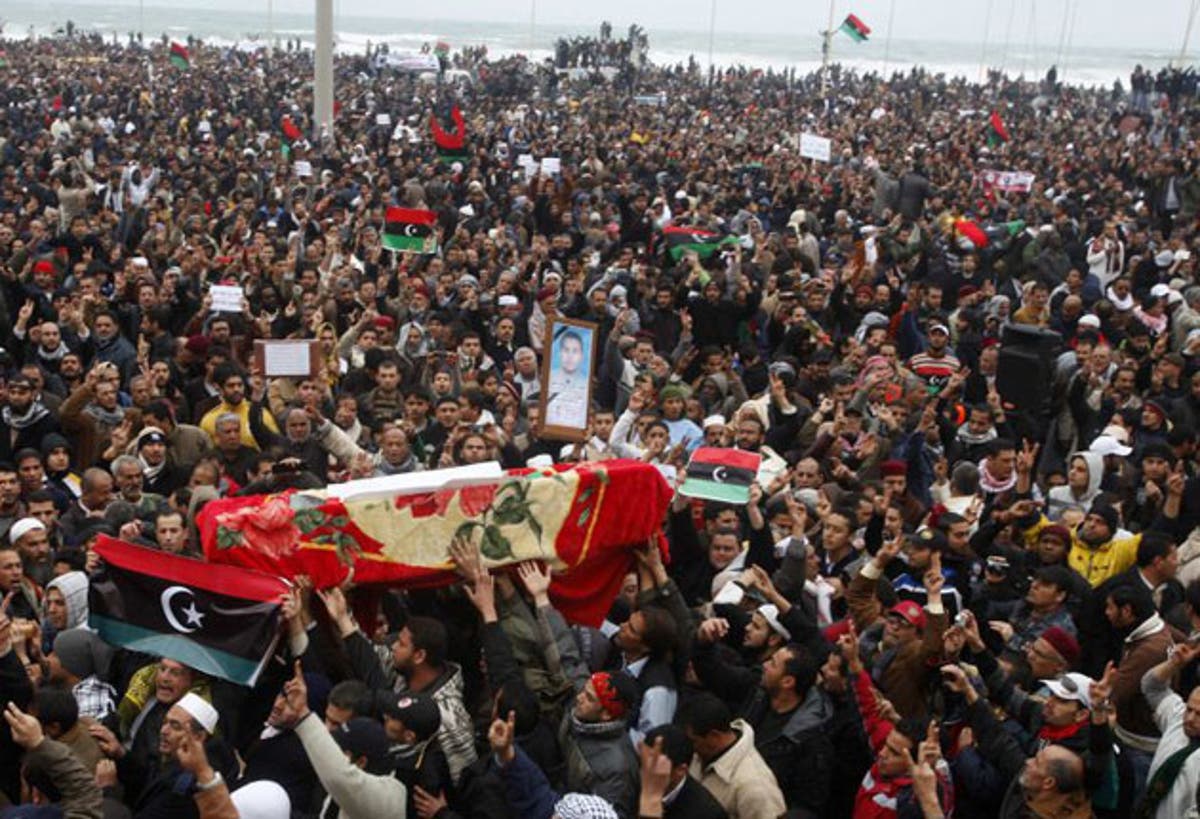 Gaddafi defiant as protesters killed | The Independent | The Independent