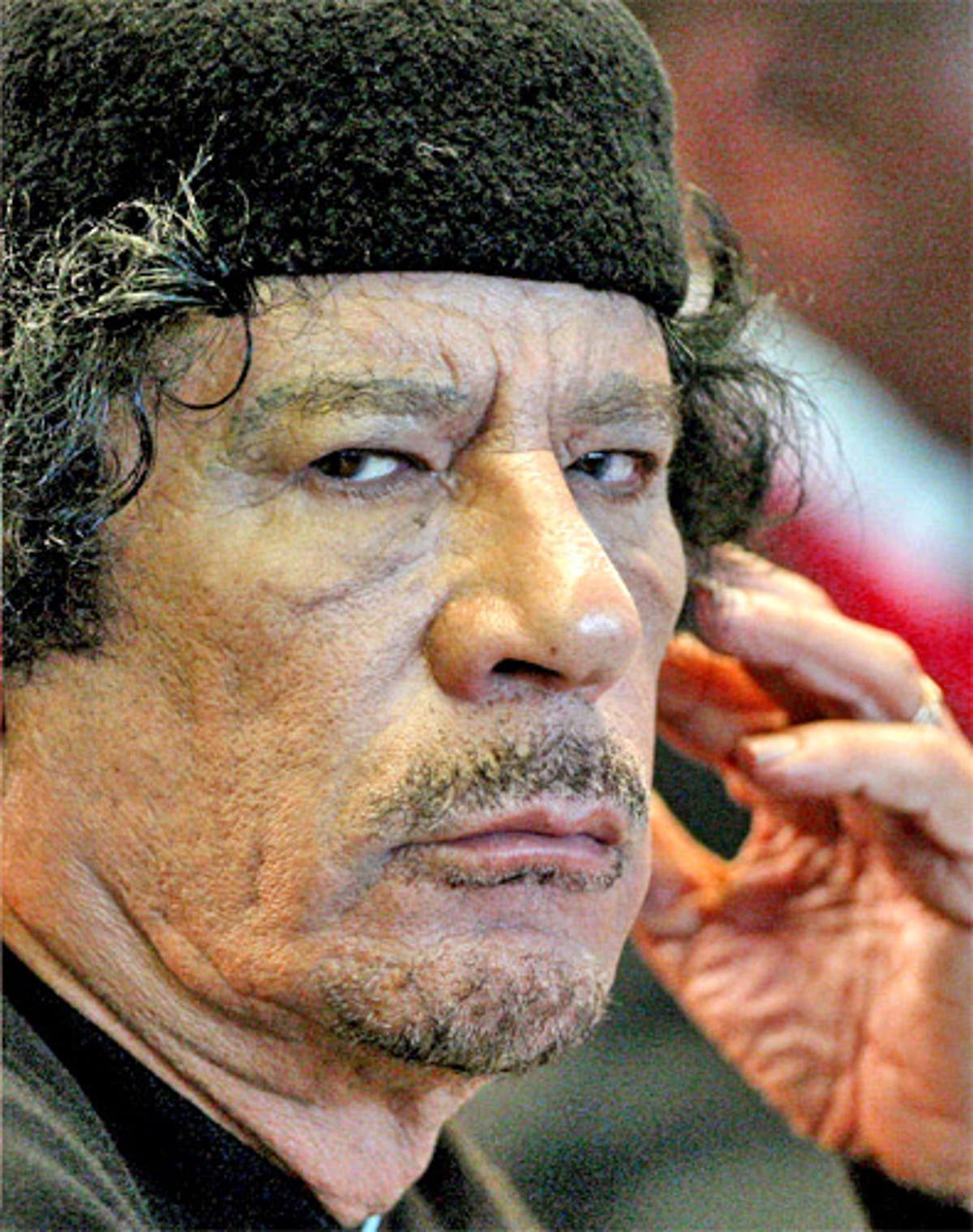 Gaddafi vows he will never surrender and rails against 'crusade on ...