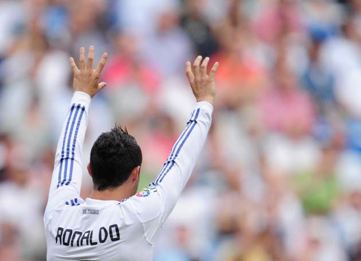 Ronaldo shares success after breaking scoring record | The Independent ...