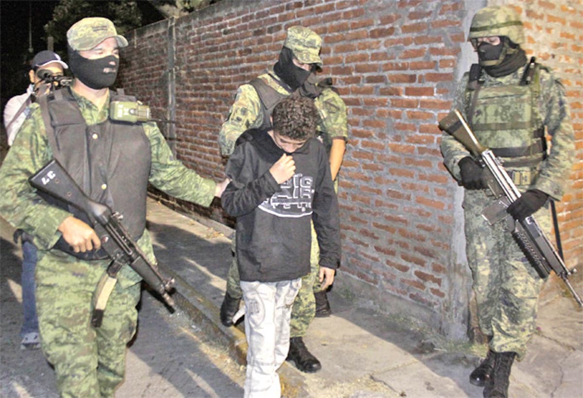 Drugs hitman aged 14 on trial after beheading four victims in Mexico ...