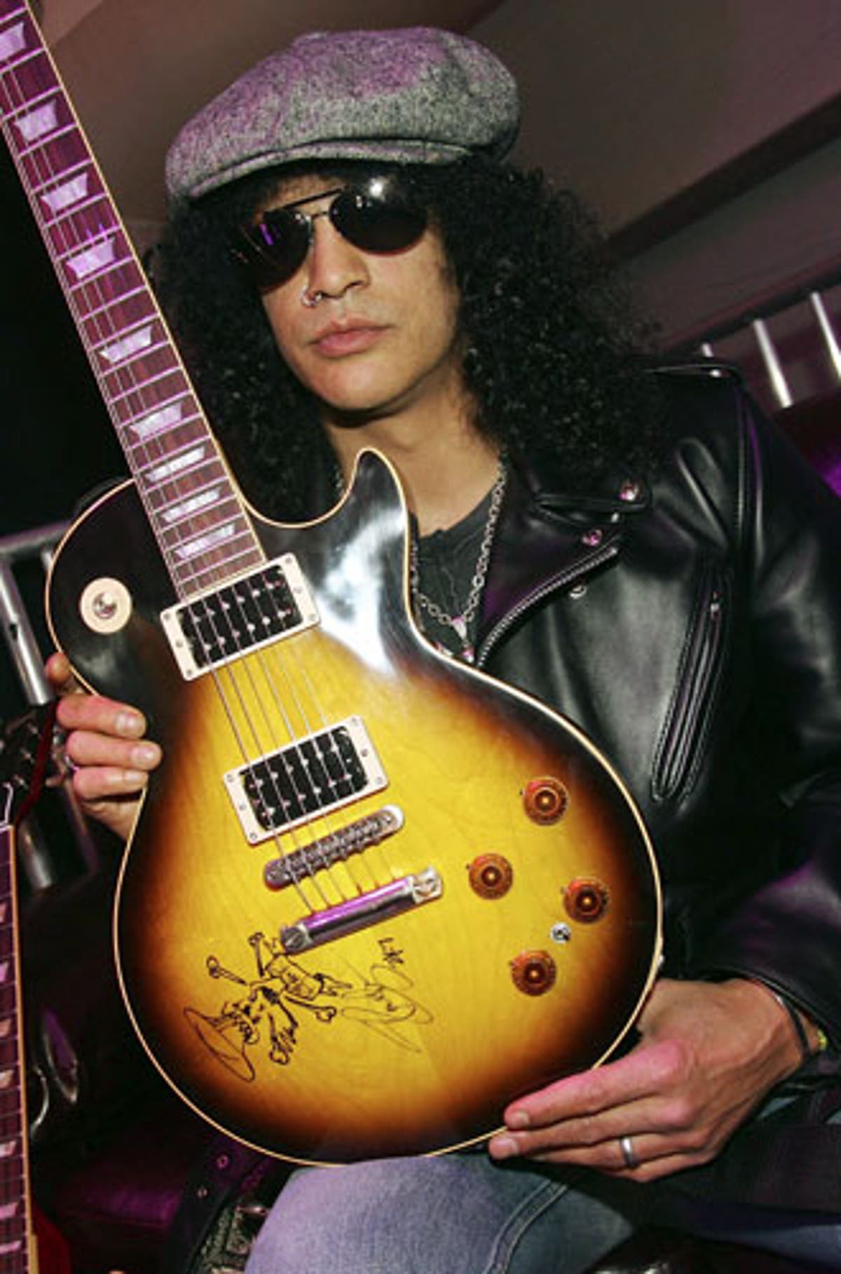 Ex-Guns N' Roses guitarist Slash honored with Hollywood star | The ...