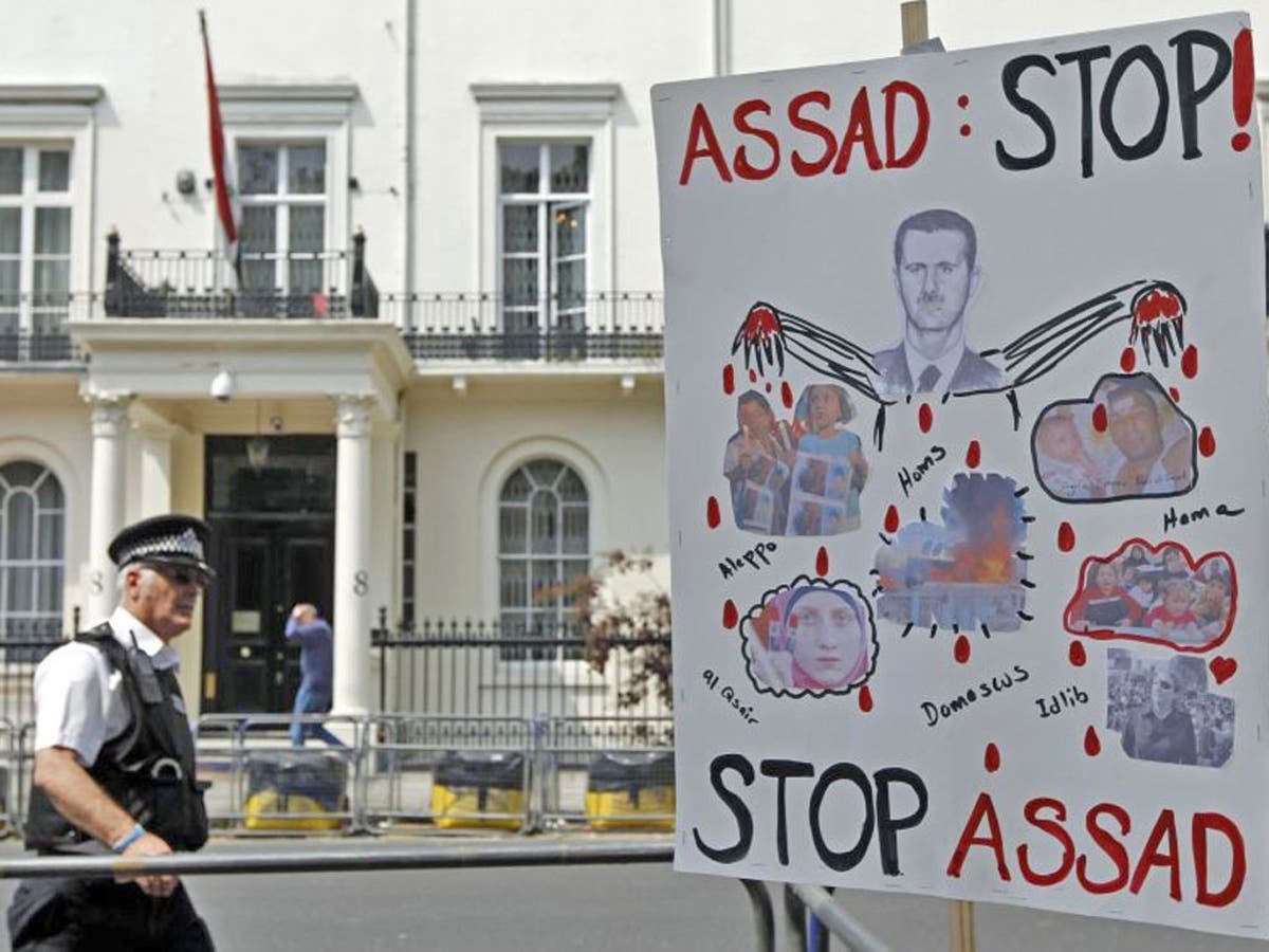 Assad's top man in London goes into hiding in protest at regime's ...