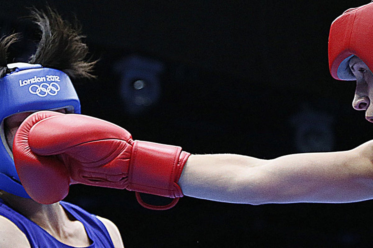 Russian Elena Savelyeva wins first ever women's Olympic boxing match ...