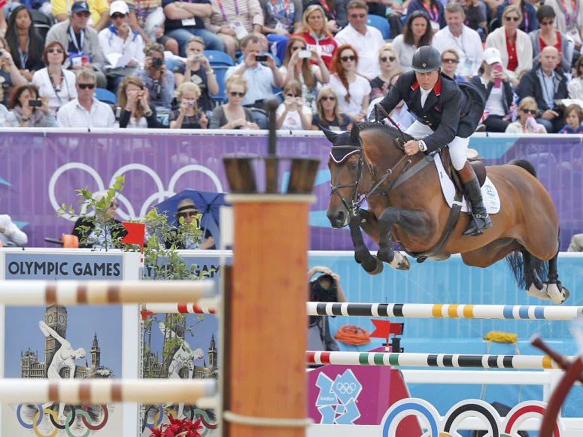 King Charles holds nerve in jump-off to guide GB to gold | The ...