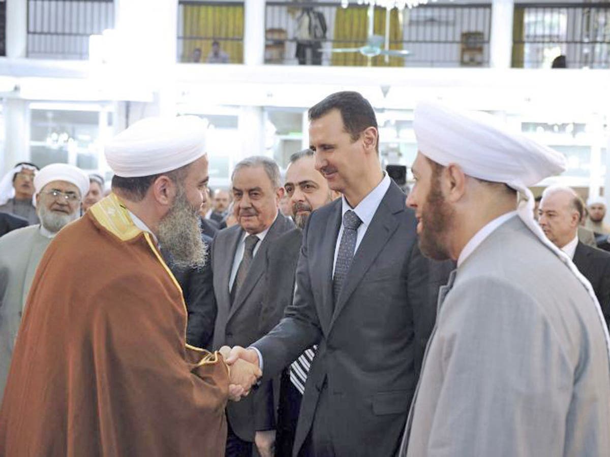 Assad makes rare public appearance at mosque | The Independent | The ...