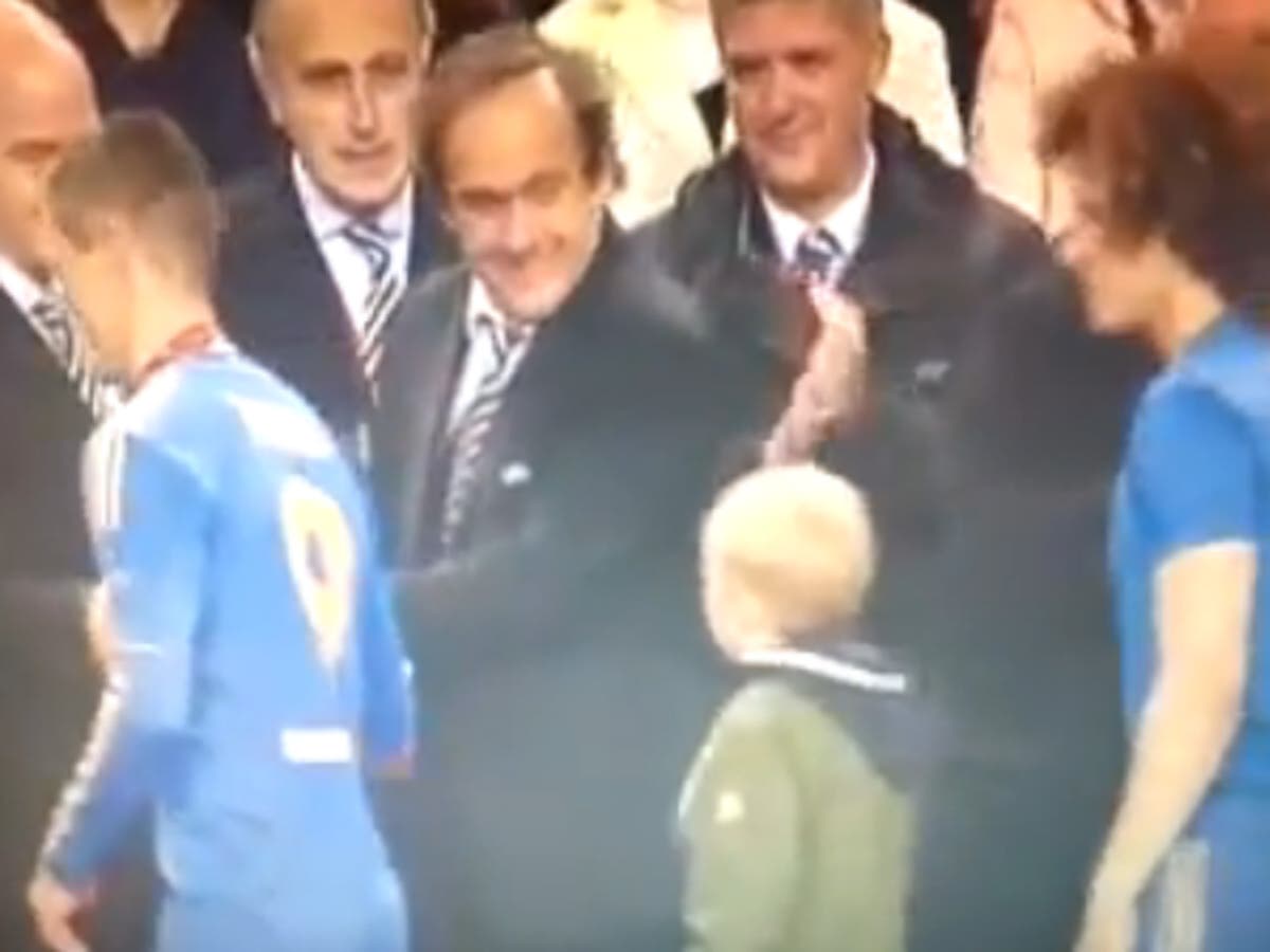 Video: 11-year-old Liverpool fan picks up the Europa League trophy with ...