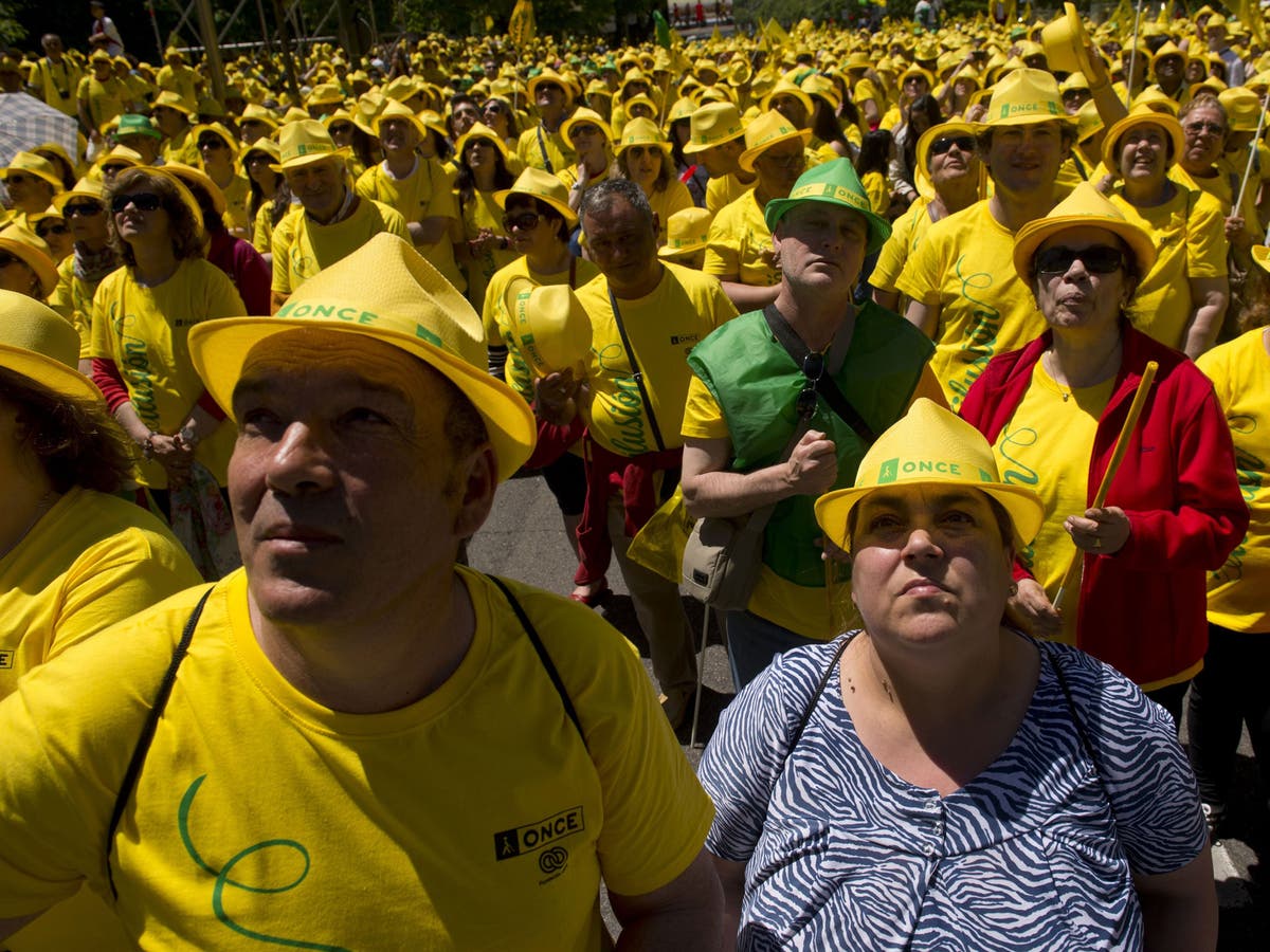More than 100,000 turn out for Spain's biggest disabled organisation ...