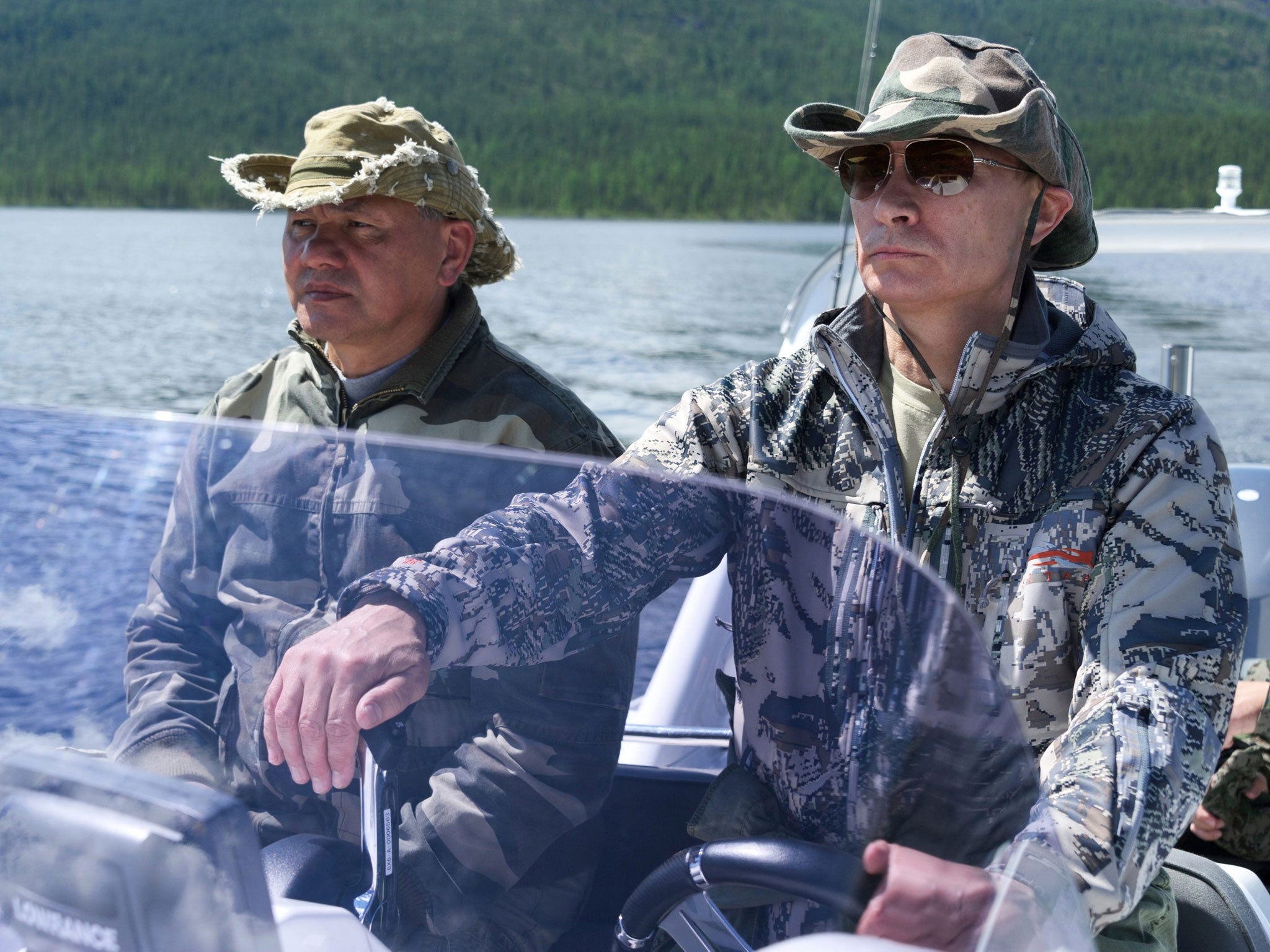 Undisputed master of the macho photo op: Vladmir Putin goes fishing ...