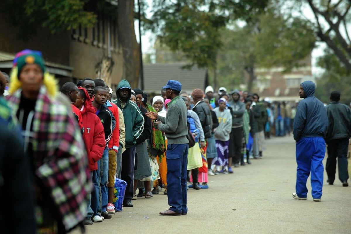 Zimbabwe riot police stand by as claims of vote-fixing by Mugabe shroud ...
