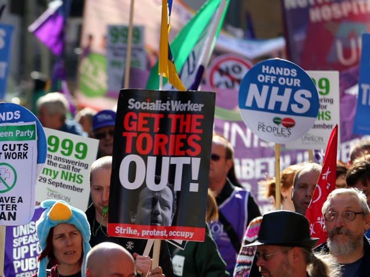 Tory Party Conference: 50,000 march in Manchester rally against ...