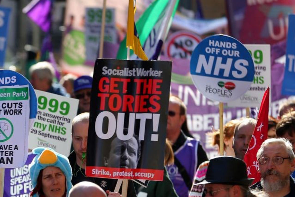 Tory Party Conference: 50,000 march in Manchester rally against ...
