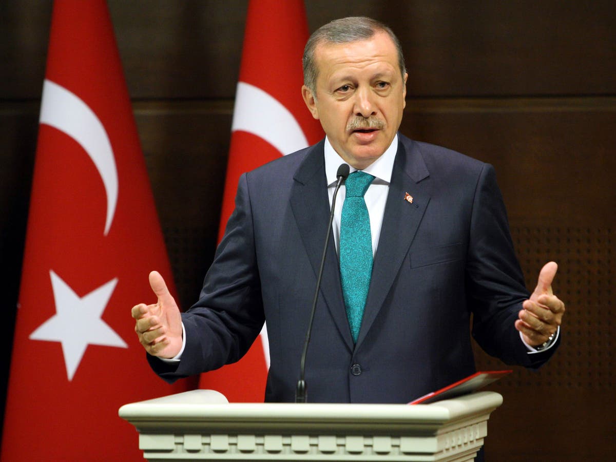Turkish Prime Minister Recep Tayyip Erdogan removes ban on headscarves ...