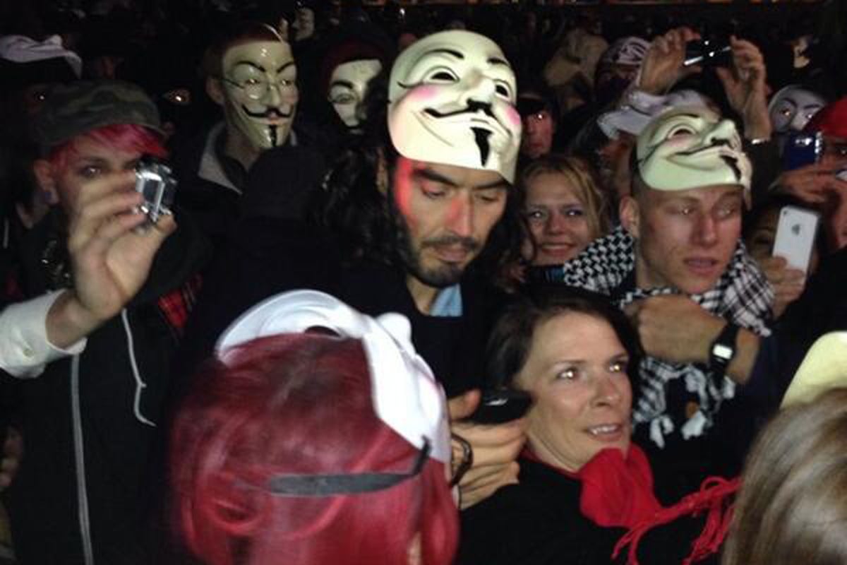 Russell Brand joins thousands to protest for Anonymous Million Mask ...