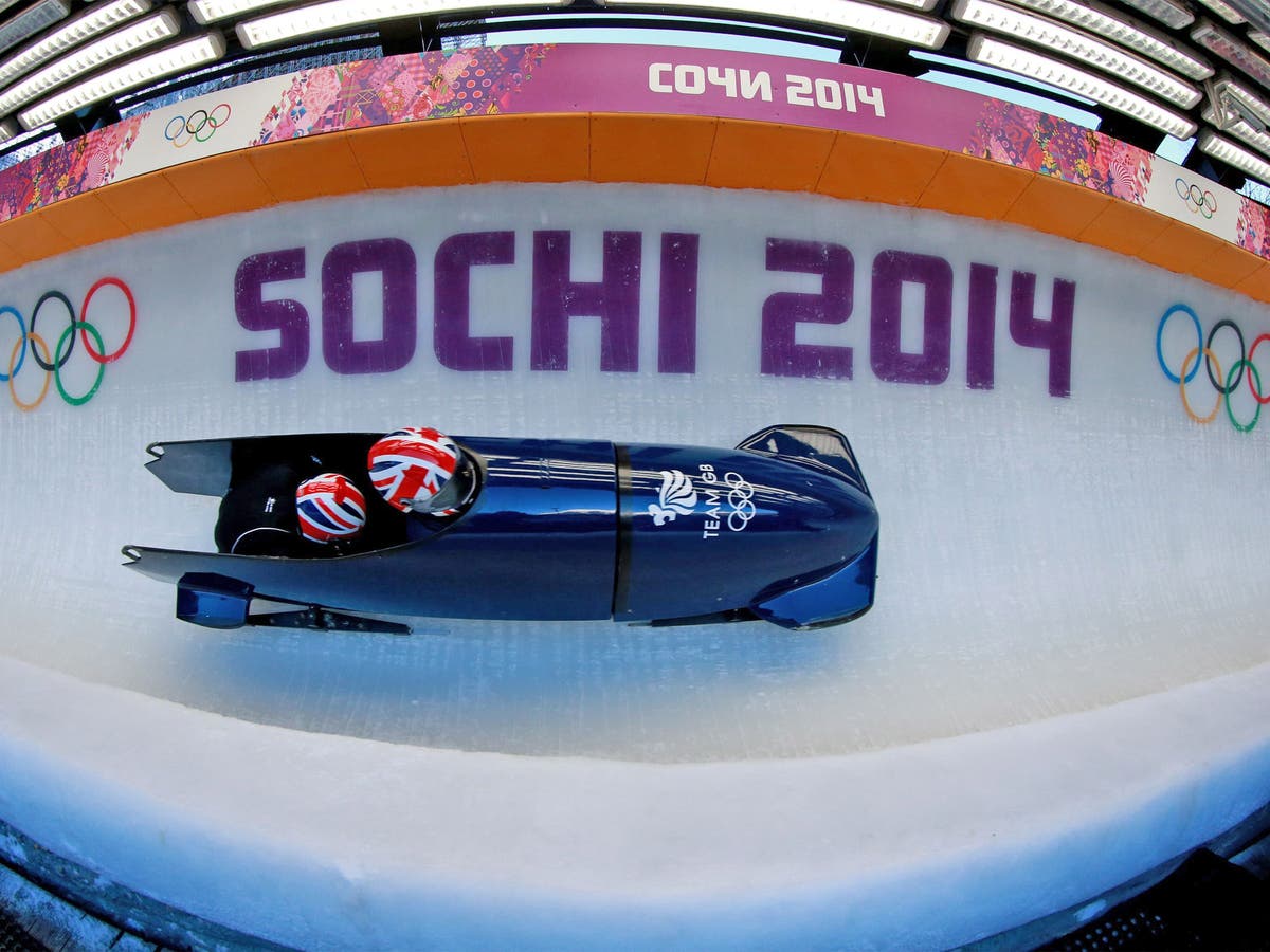 Sochi Winter Olympics 2014: Track worker breaks both legs after being ...