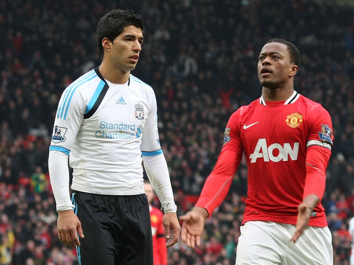 Liverpool striker Luis Suarez risks reopening Patrice Evra racism row ...