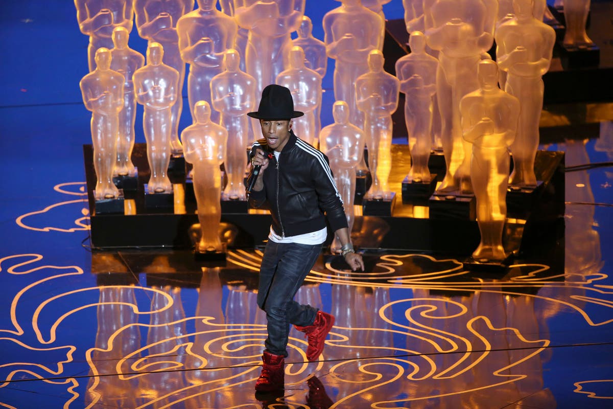 Pharrell Williams' Happy surpasses sales of 1 million in the UK as it ...