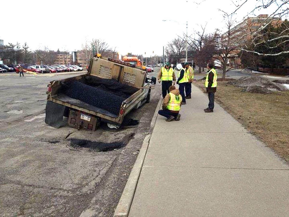 You had one job: pothole-filling crew get stuck in pothole | The ...