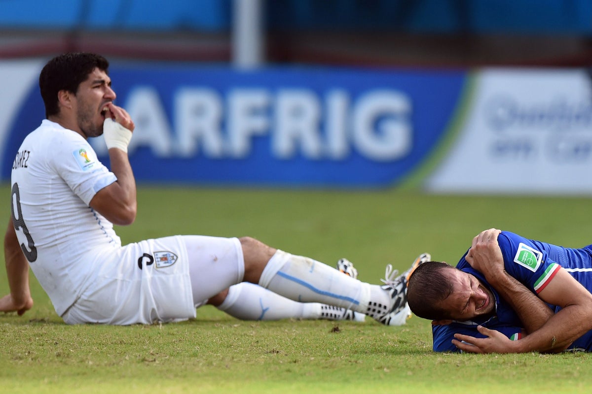 Luis Suarez bite: Fifa charges Uruguay striker with biting Giorgio ...