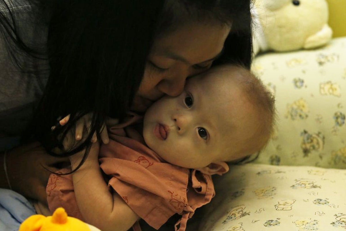 Baby Gammy: Australian authorities track down couple who 'left Down ...