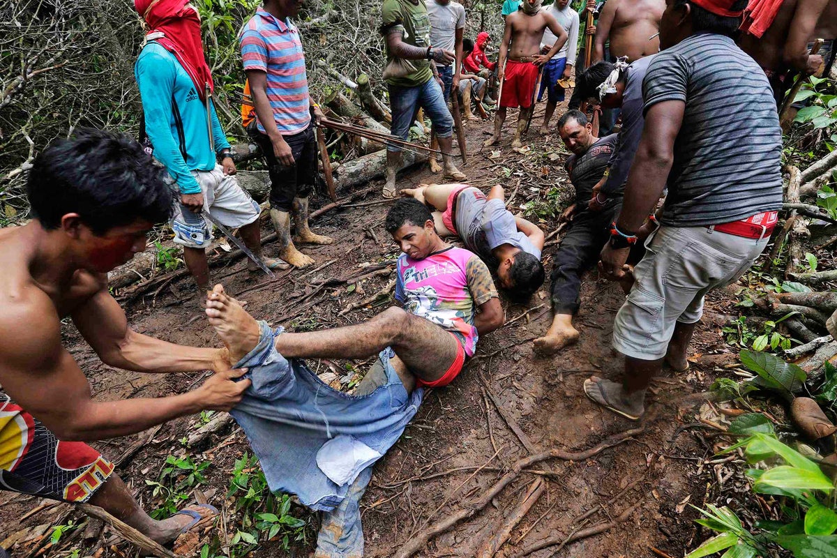 Photographs Show Amazonian Tribe Capturing And Stripping Illegal