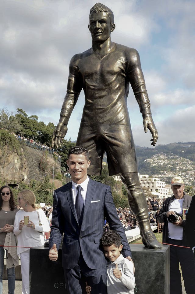 Cristiano Ronaldo suitably impressed by the bronze statue of himself ...