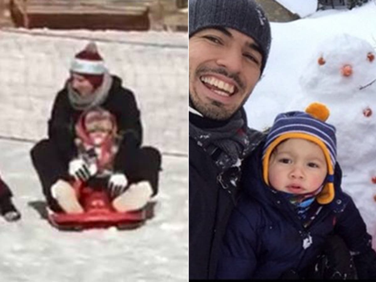 Luis Suarez joins Lionel Messi in making the most of the snow in Spain ...