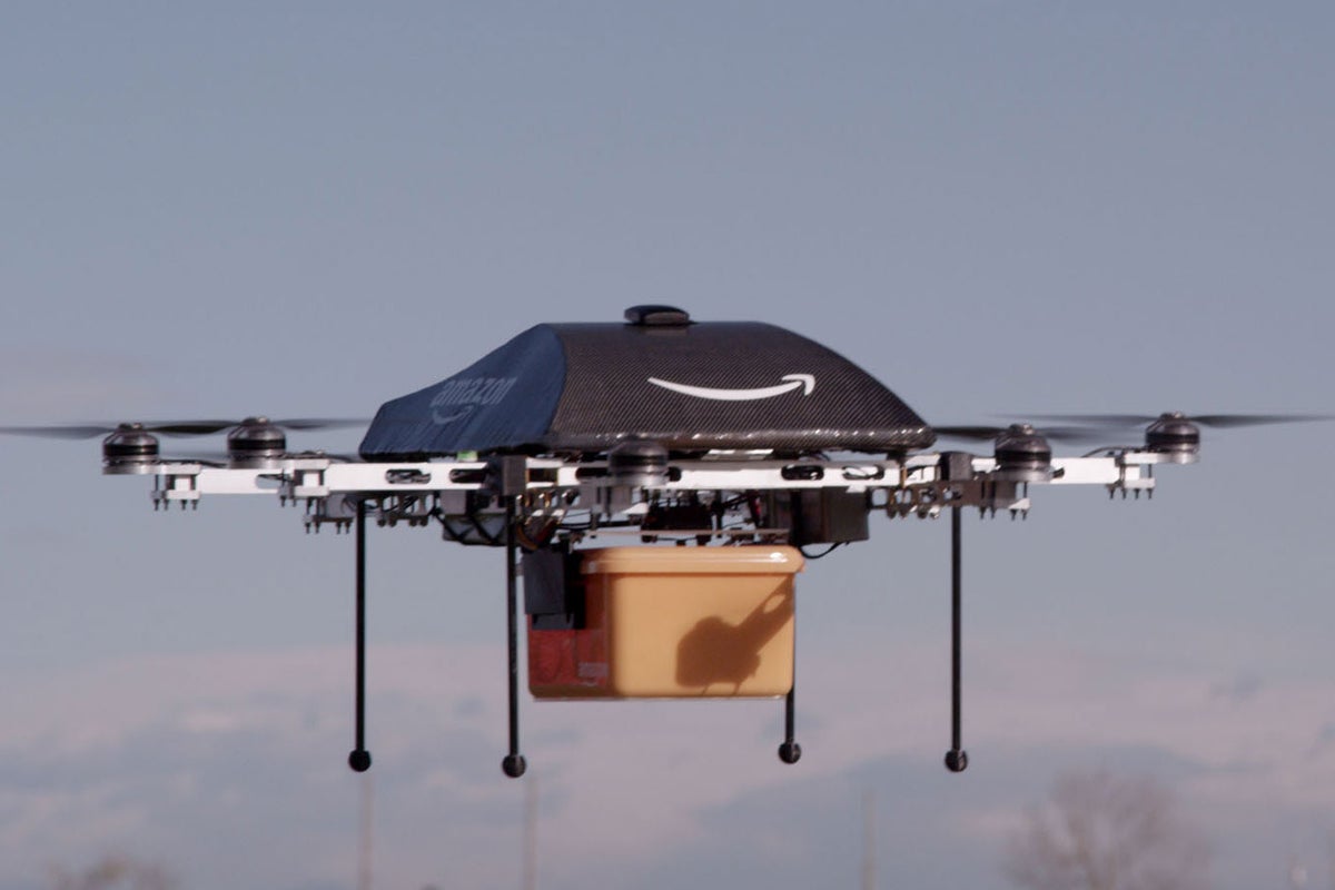 Alex Jones smashes drone with sword during Amazon rant | The Independent