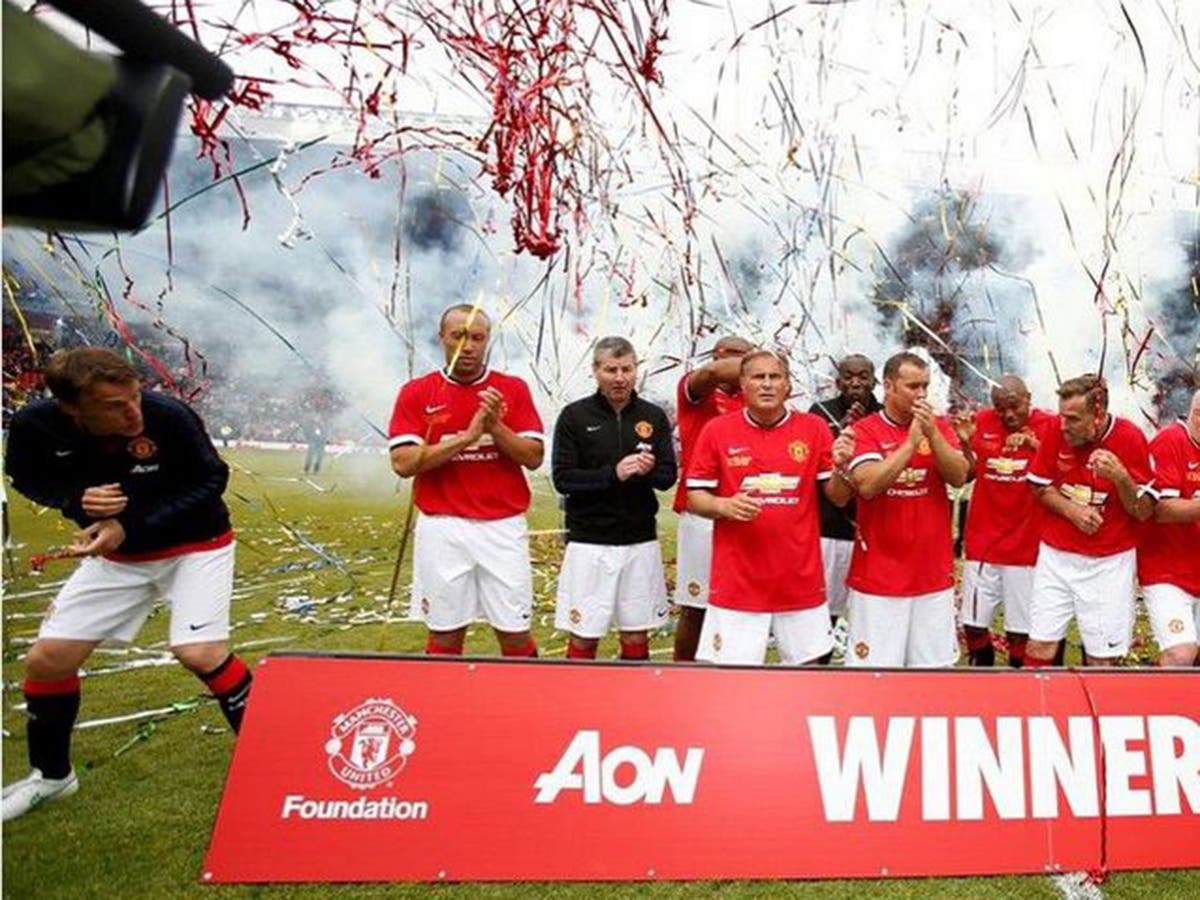 Phil Neville scared witless after pyrotechnics surprise Manchester ...