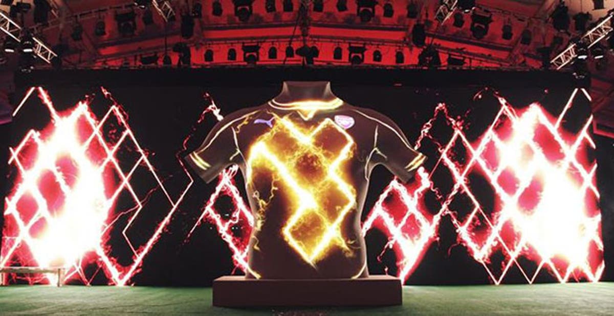 Arsenal 2015/16 away shirt unveiled: Watch as gold shirt launched in ...
