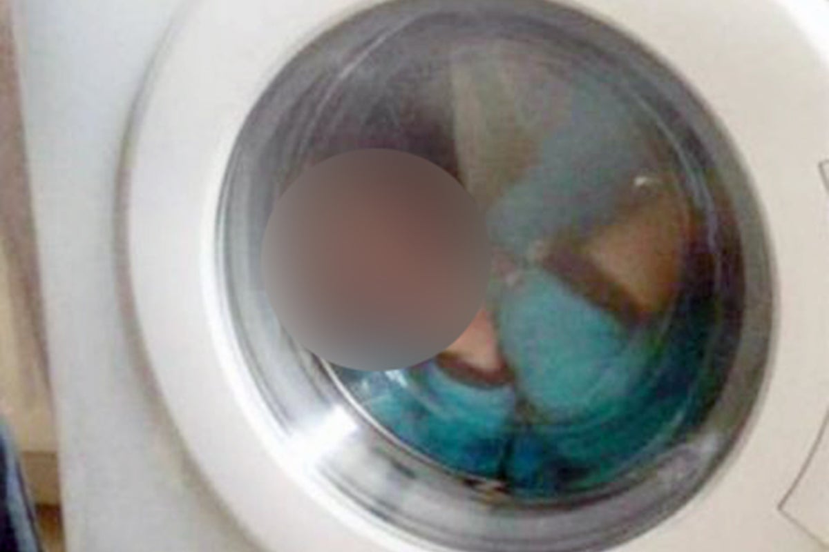 Woman photographed toddler with Down's syndrome in washing machine ...